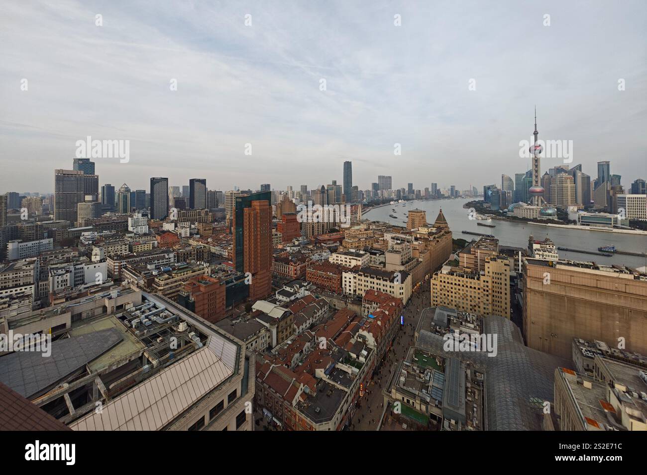 SHANGHAI, CHINA - JANUARY 7, 2025 - Real estate buildings on both sides ...