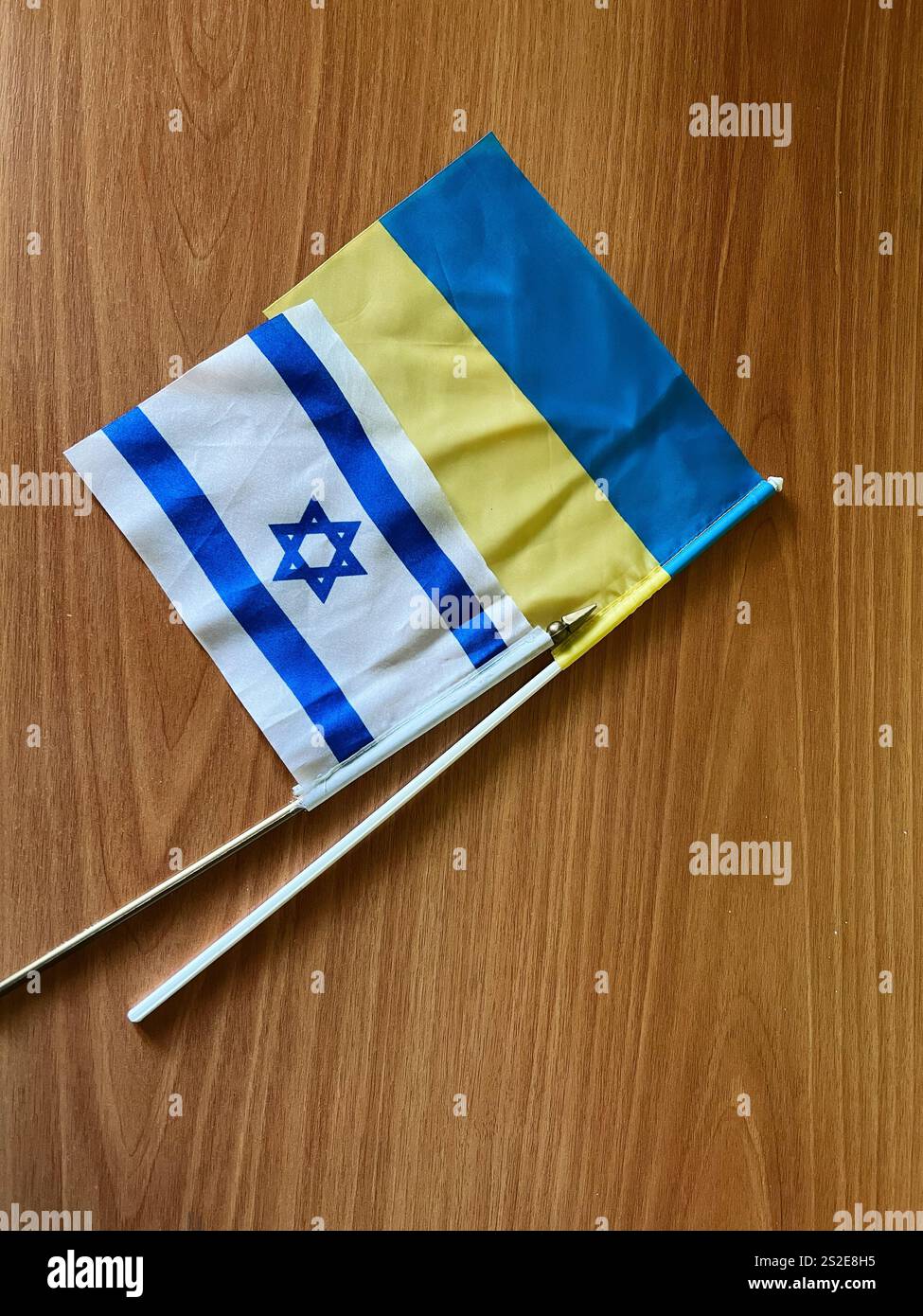 Ukraine and israel flags on table hi-res stock photography and images ...