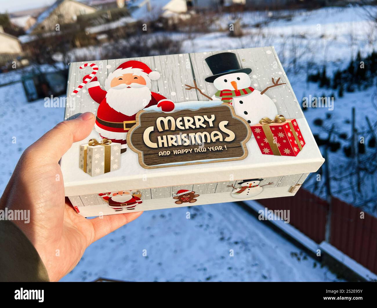 Kyiv, Ukraine - January 07, 2025: A festive gift box featuring Santa ...