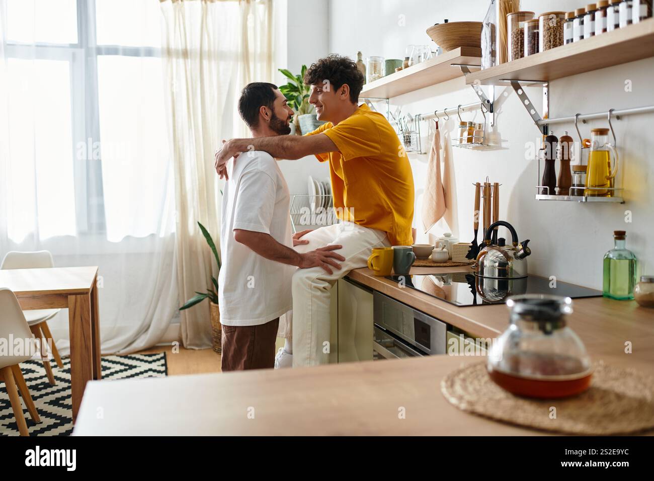 Two joyful men embrace in their cozy apartment, cherishing their love ...