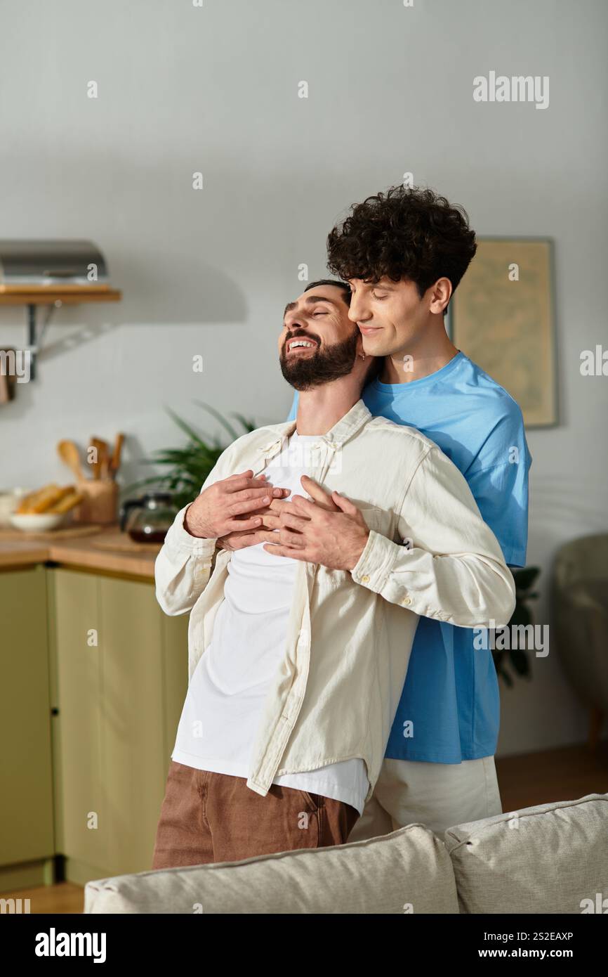 Two men share a tender moment together, enjoying their time in a ...