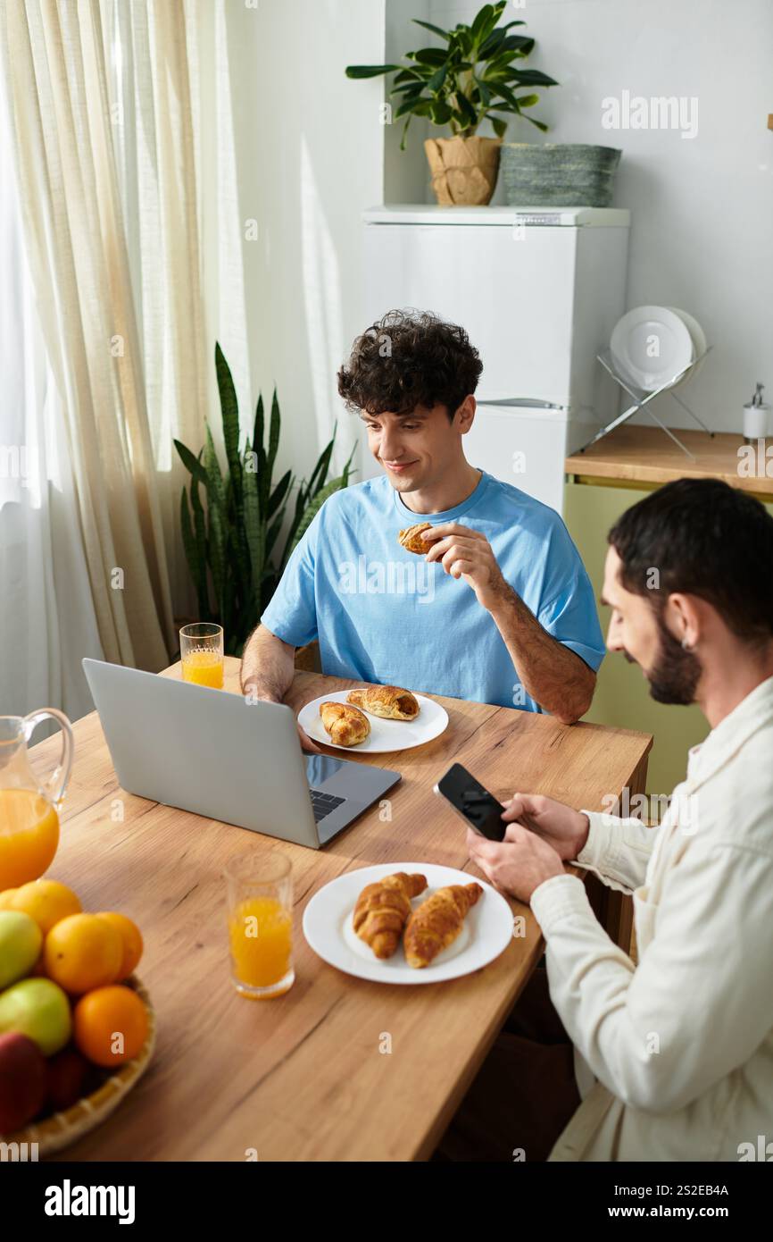 Two men share a delightful breakfast, enjoying pastries and drinks in ...