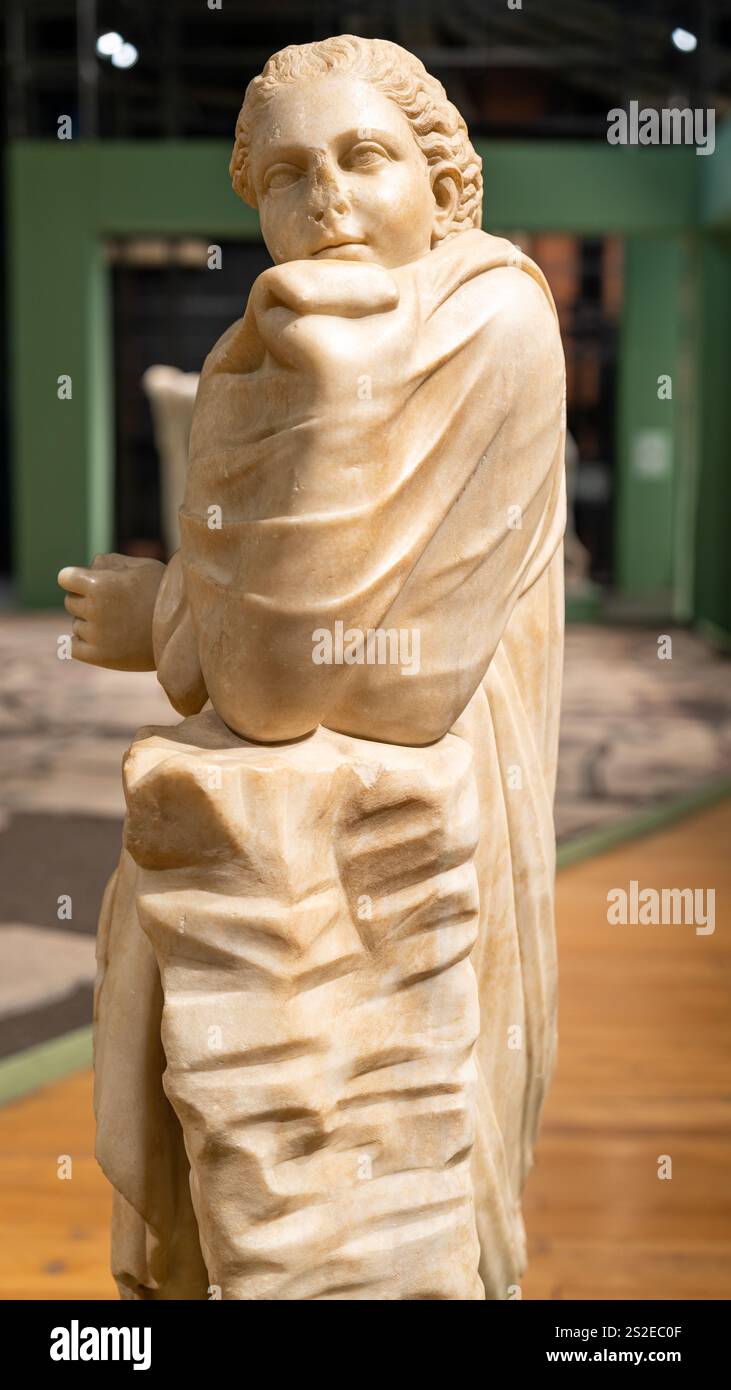 Ancient marble statue of roman woman wrapped in a transparent cloth ...