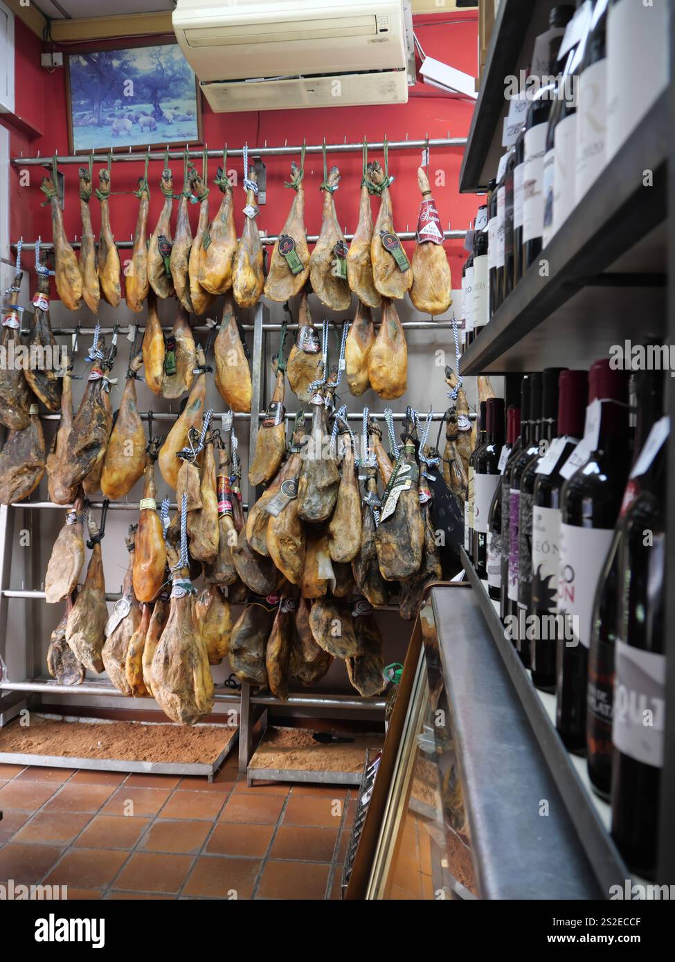 Typical Andalusian ham hangs in a shop in Ronda Spain Stock Photo - Alamy