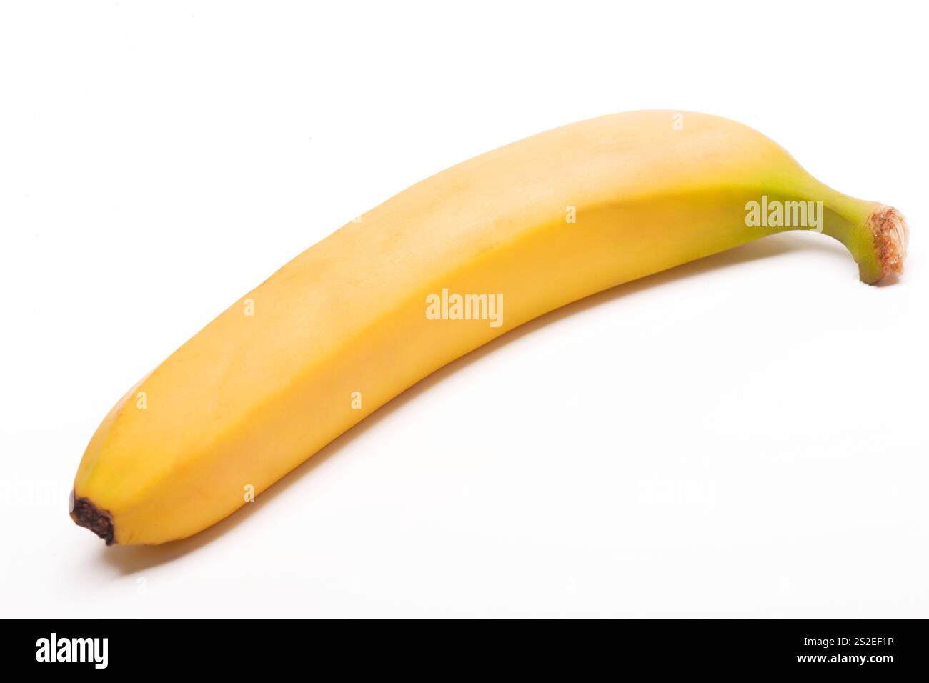 Single banana isolated on white background Stock Photo - Alamy