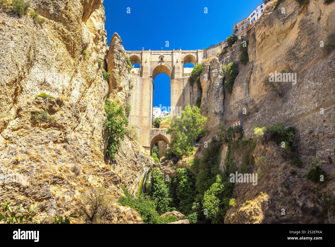 The Puente Nuevo bridge in El Tajo gorge in Ronda town in Spain ...