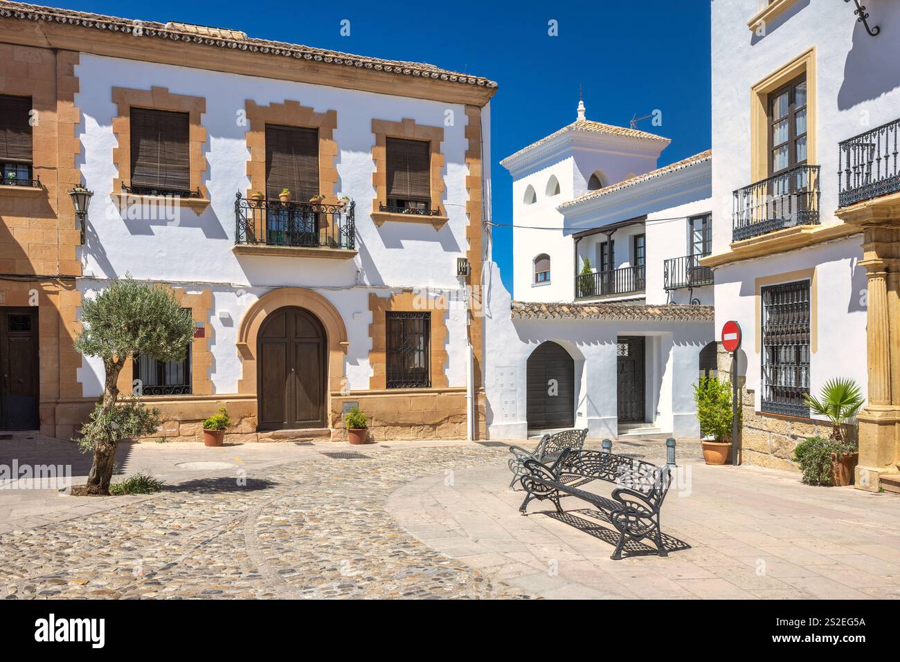 Ronda town in Spain. Charming town square with traditional architecture ...