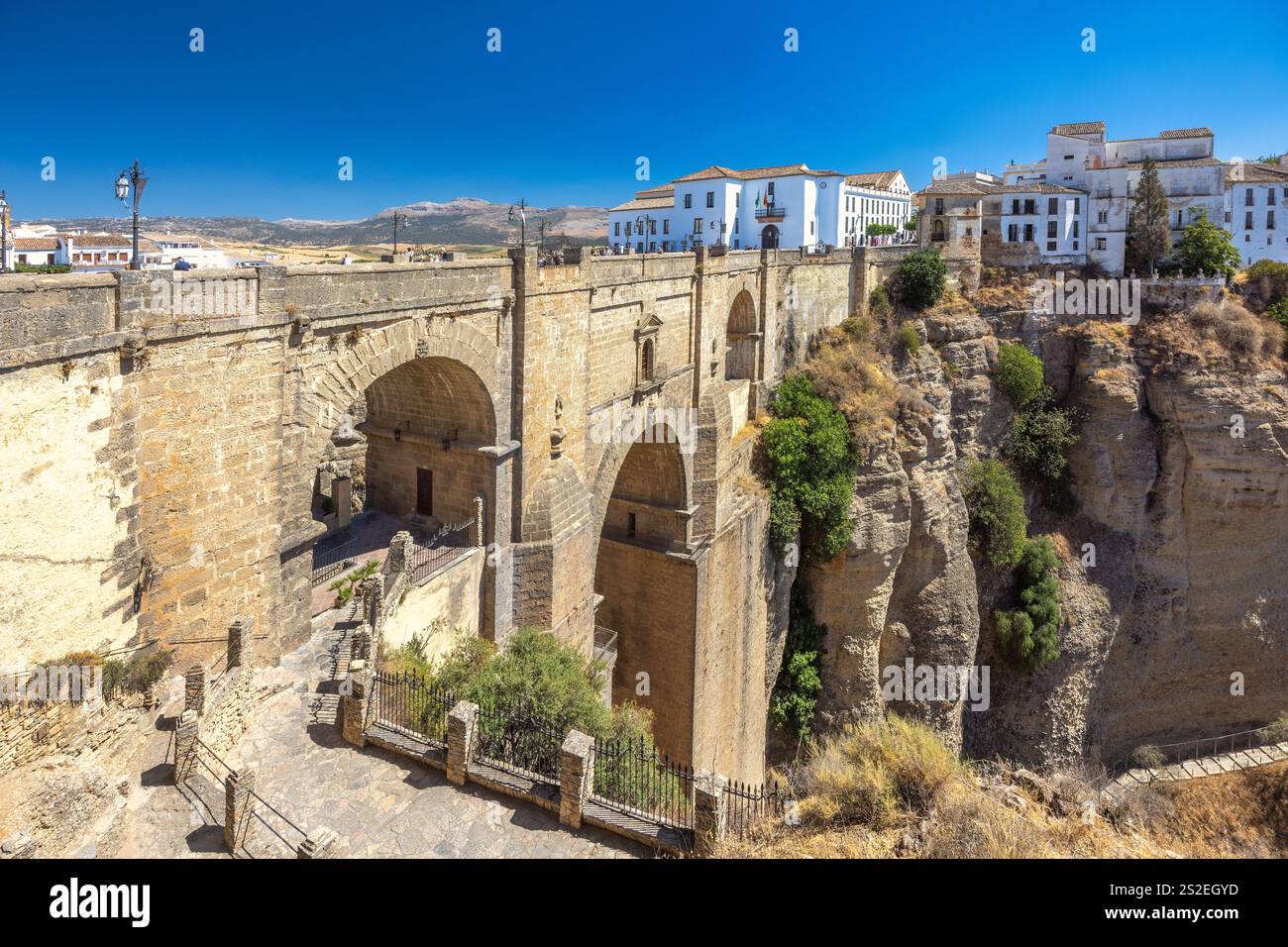 The Puente Nuevo bridge in El Tajo gorge in Ronda town in Spain ...