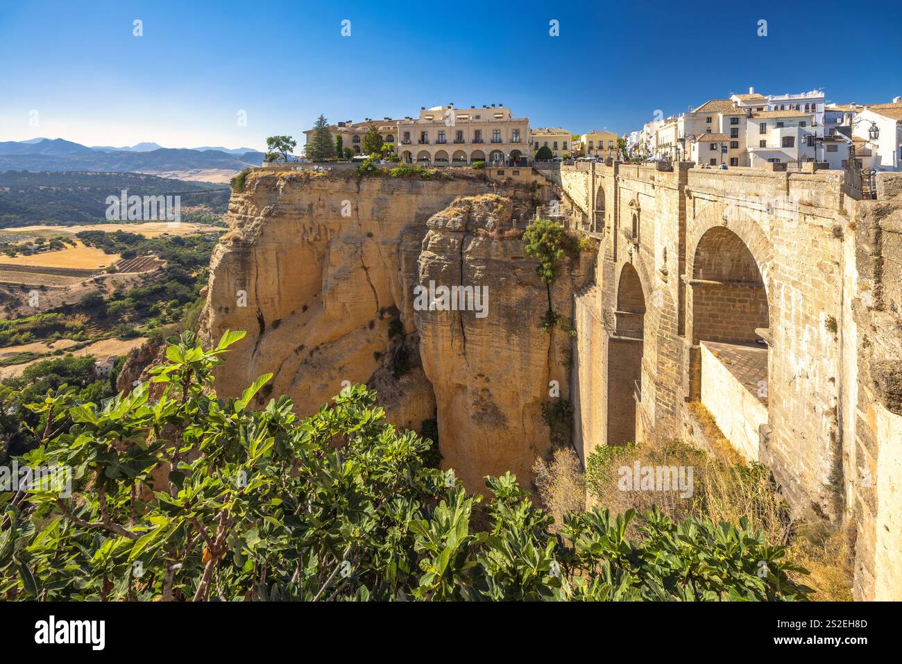 The Puente Nuevo bridge in El Tajo gorge in Ronda town in Spain ...
