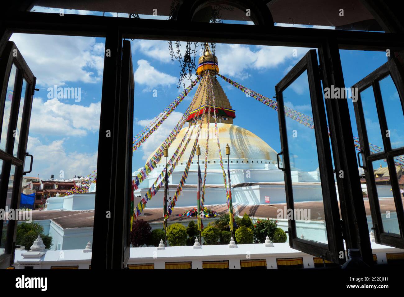 Buddhist stupa of Boudhanath, seen from the window of a restaurant ...