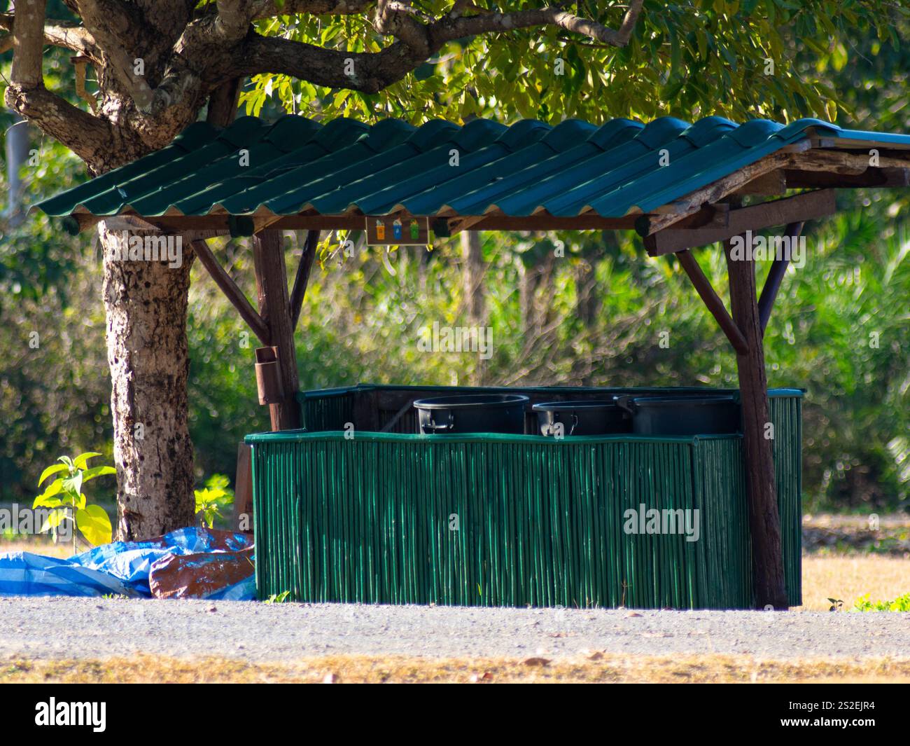 Outdoor trash bins for separating waste in public parks. Caring about ...