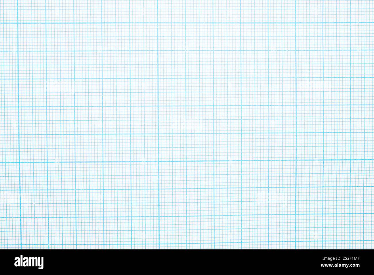 One sheet of graph paper with a plastic ruler, macro, top view Stock ...