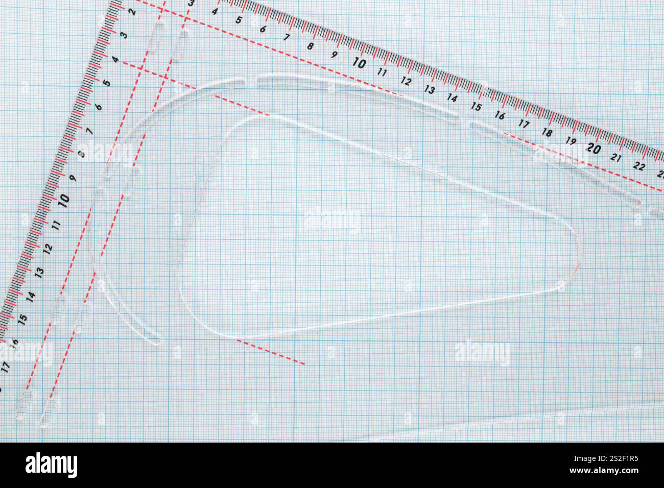 One sheet of graph paper with a plastic ruler, macro, top view Stock ...