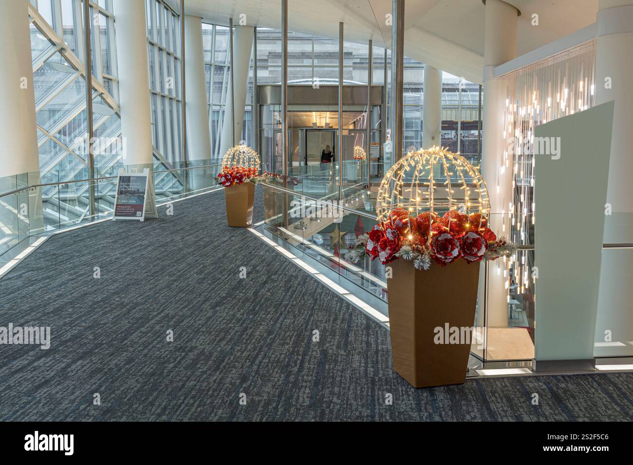 Modern elevated walkway bridge between two office buildings ...