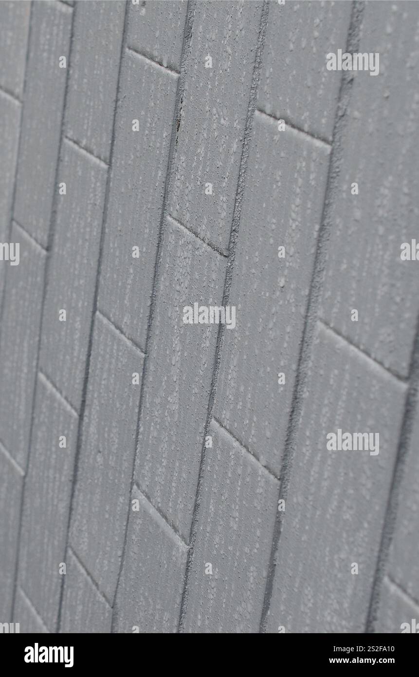 The texture of the wall from the old tile, painted gray under the ...