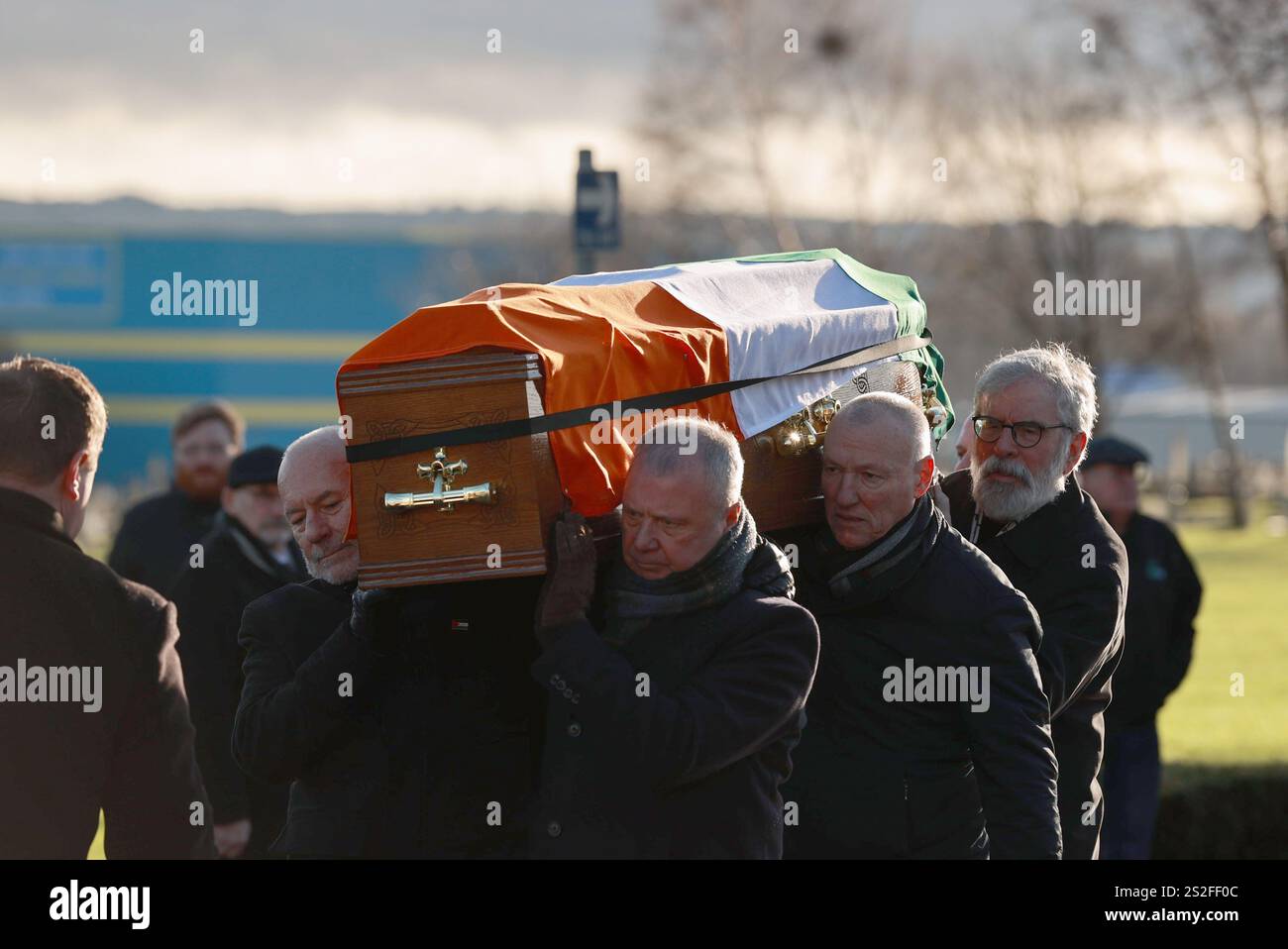 The coffin of Ted Howell arrives in Milltown Cemetery in west Belfast ...