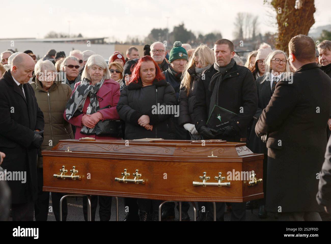 The coffin of Ted Howell arrives in Milltown Cemetery in west Belfast ...