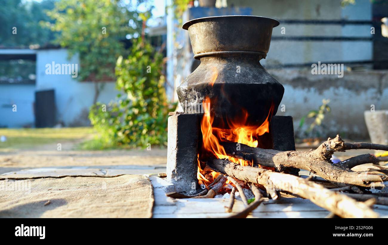Rural Vintage Kitchen using firewood in-earthen chulhas for cooking ...
