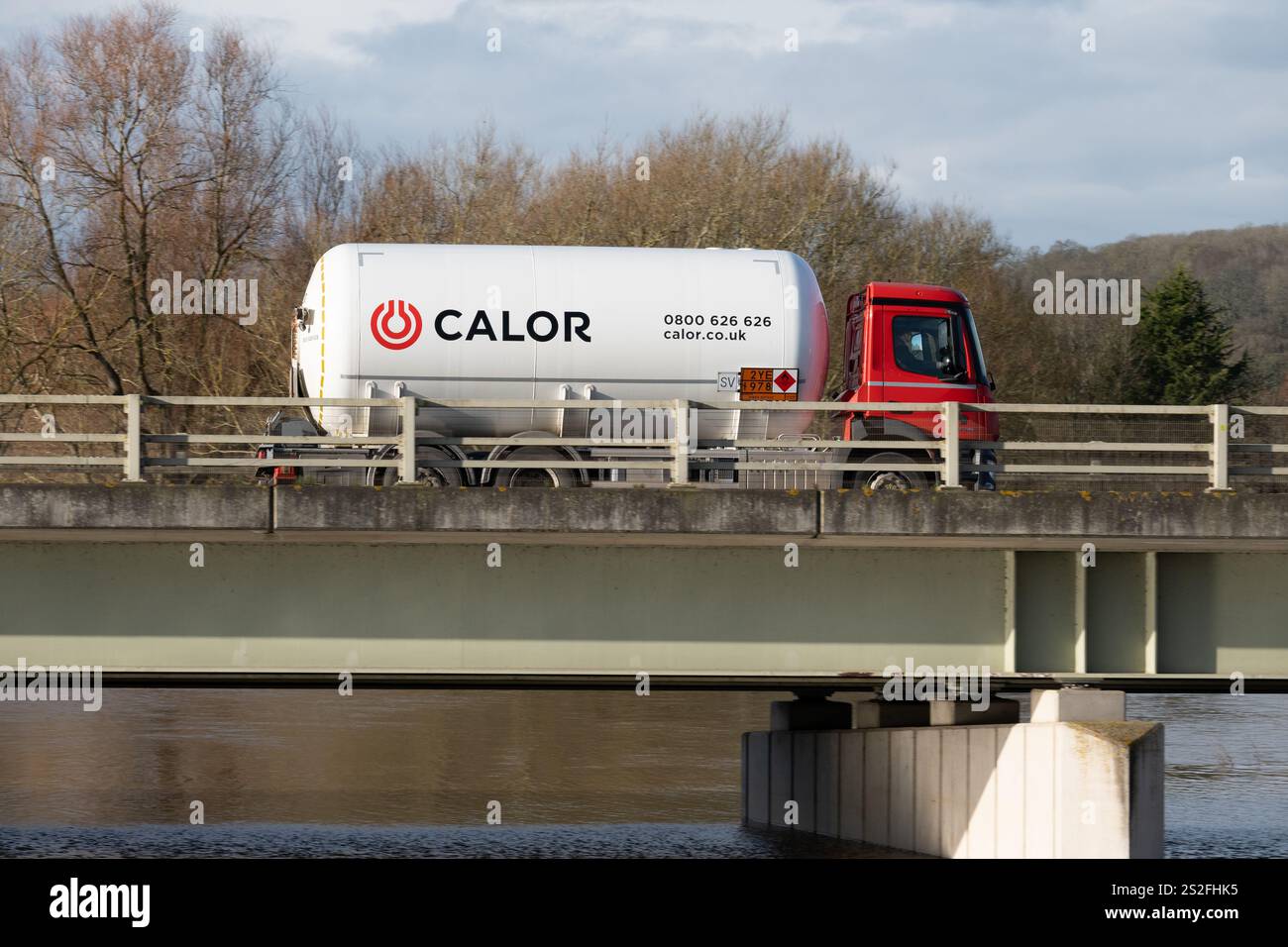 Calor tanker lorry crossing the River Avon at Barford, Warwickshire ...