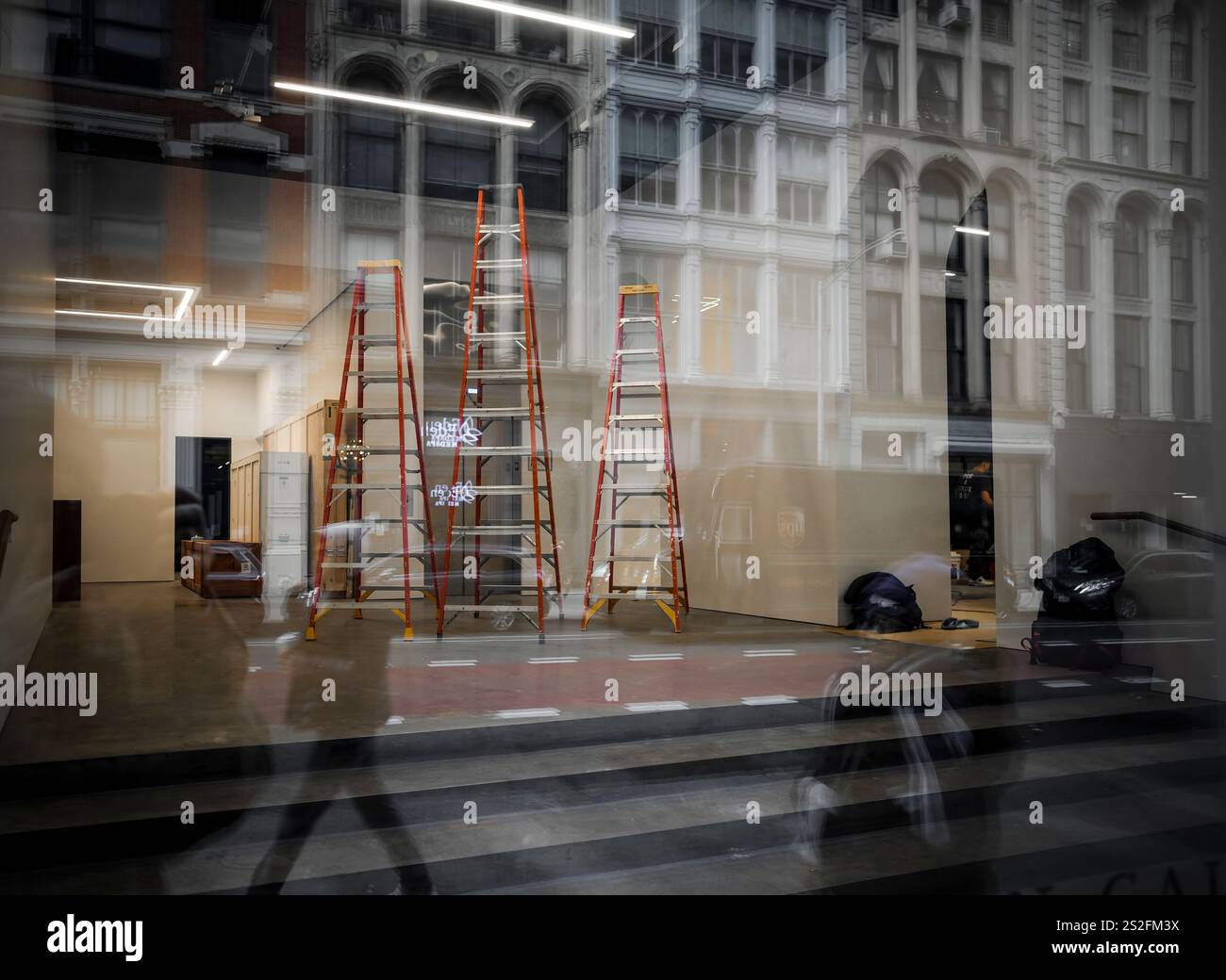 Art gallery in the process of installing a new exhibit, looking like an ...