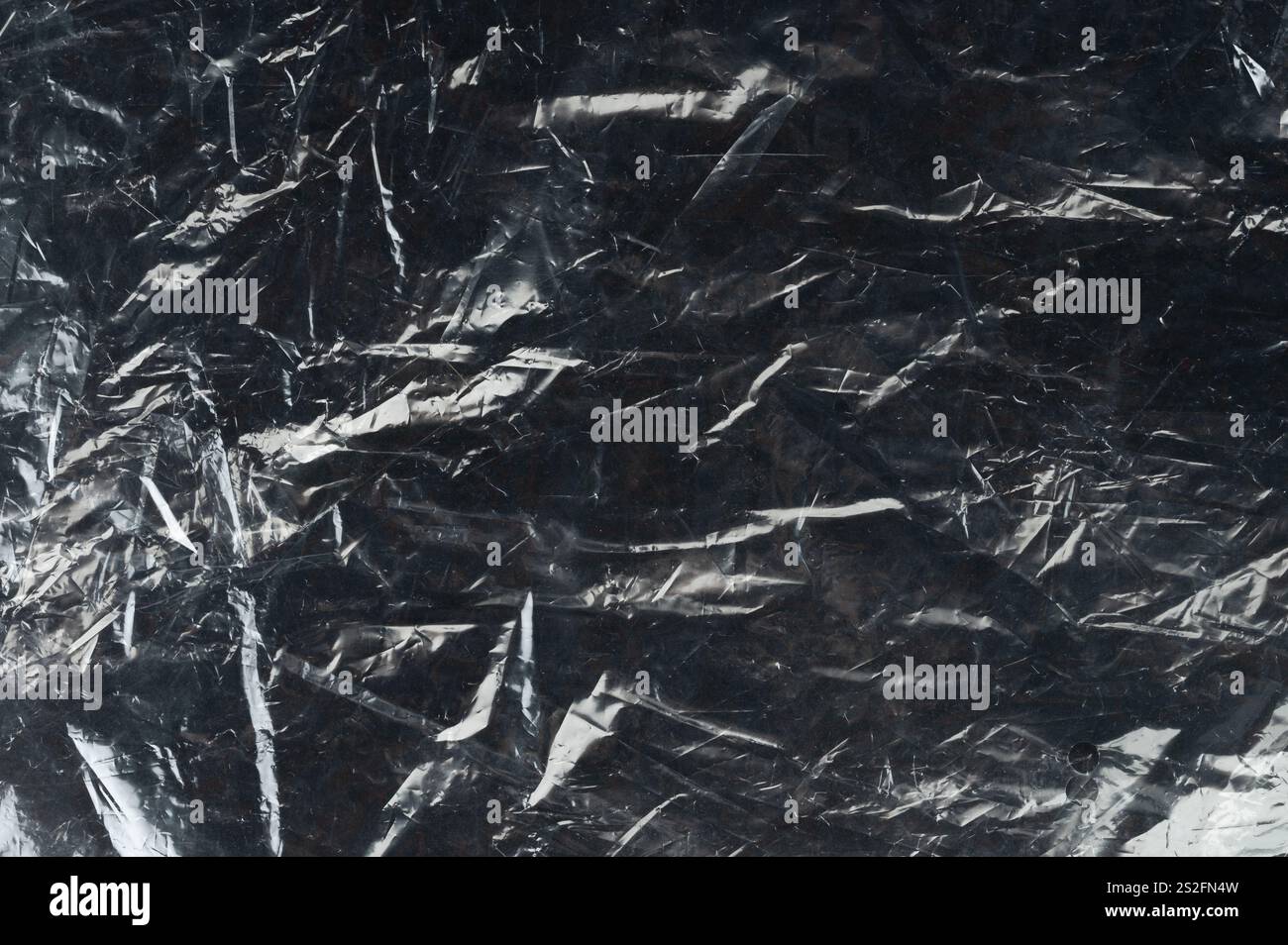 Transparent plastic wrap overlay crupled layer Stock Photo - Alamy