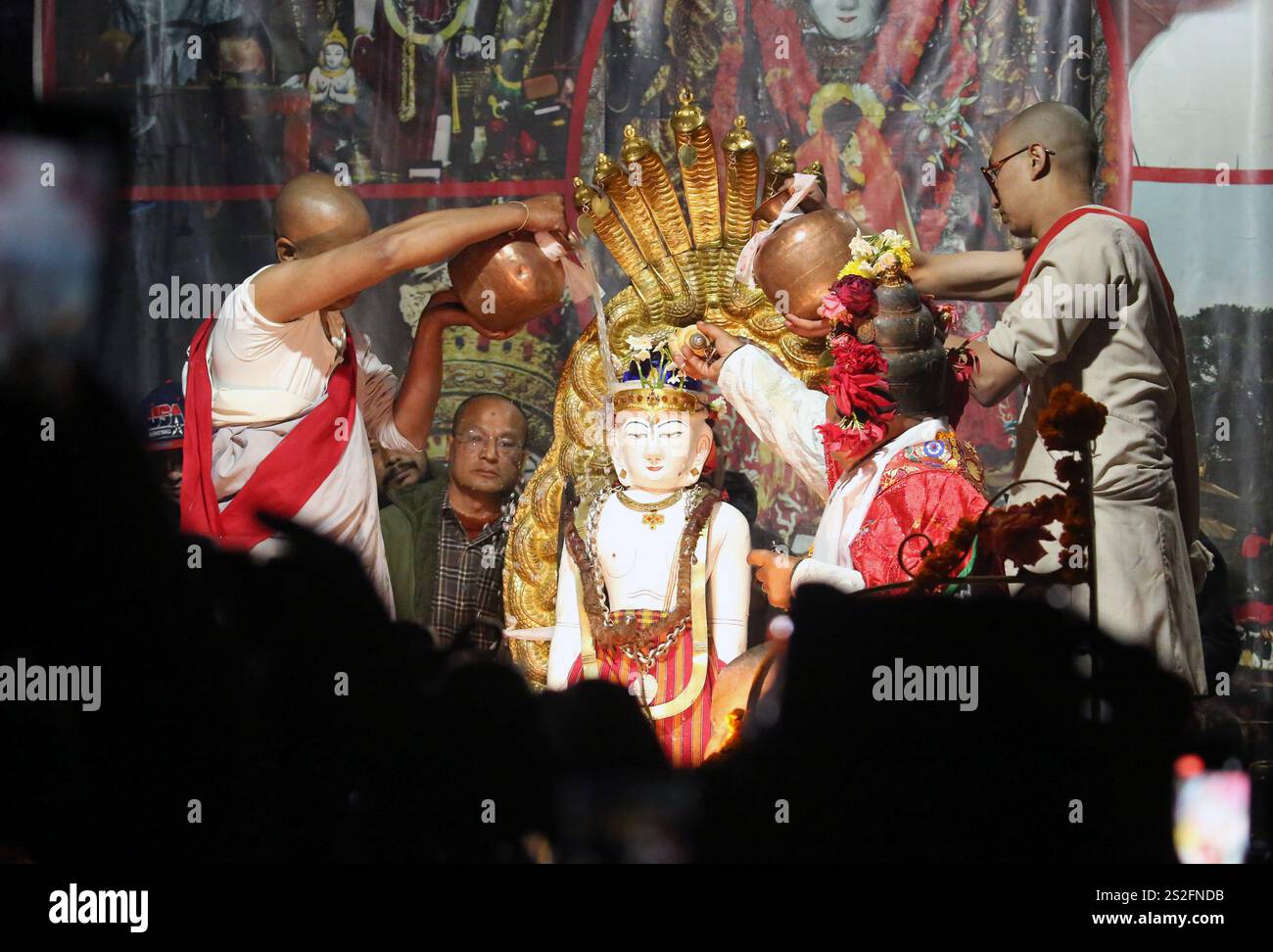 Kathmandu, Nepal. 07th Jan, 2025. January 7, 2025: Priests bath an idol ...