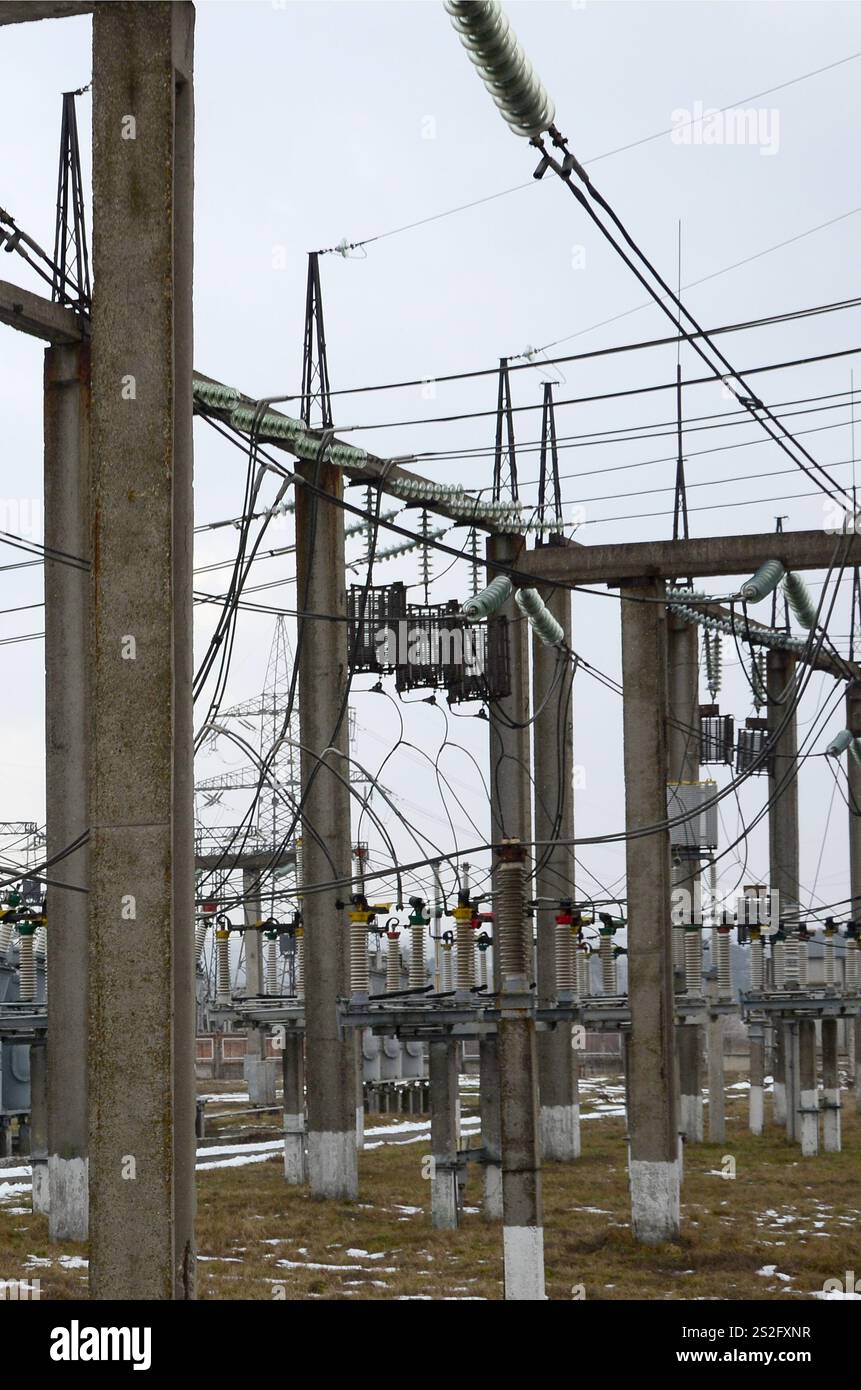 Power plant is a station of transformation. A lot of cables, poles and ...