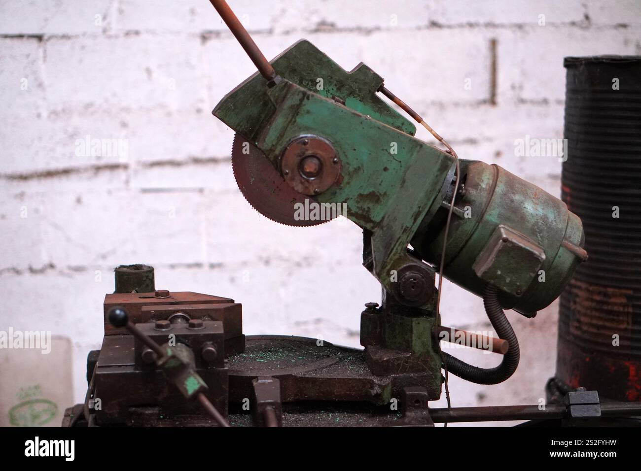 industry concept. old industrial saw for metal cutting in a factory ...