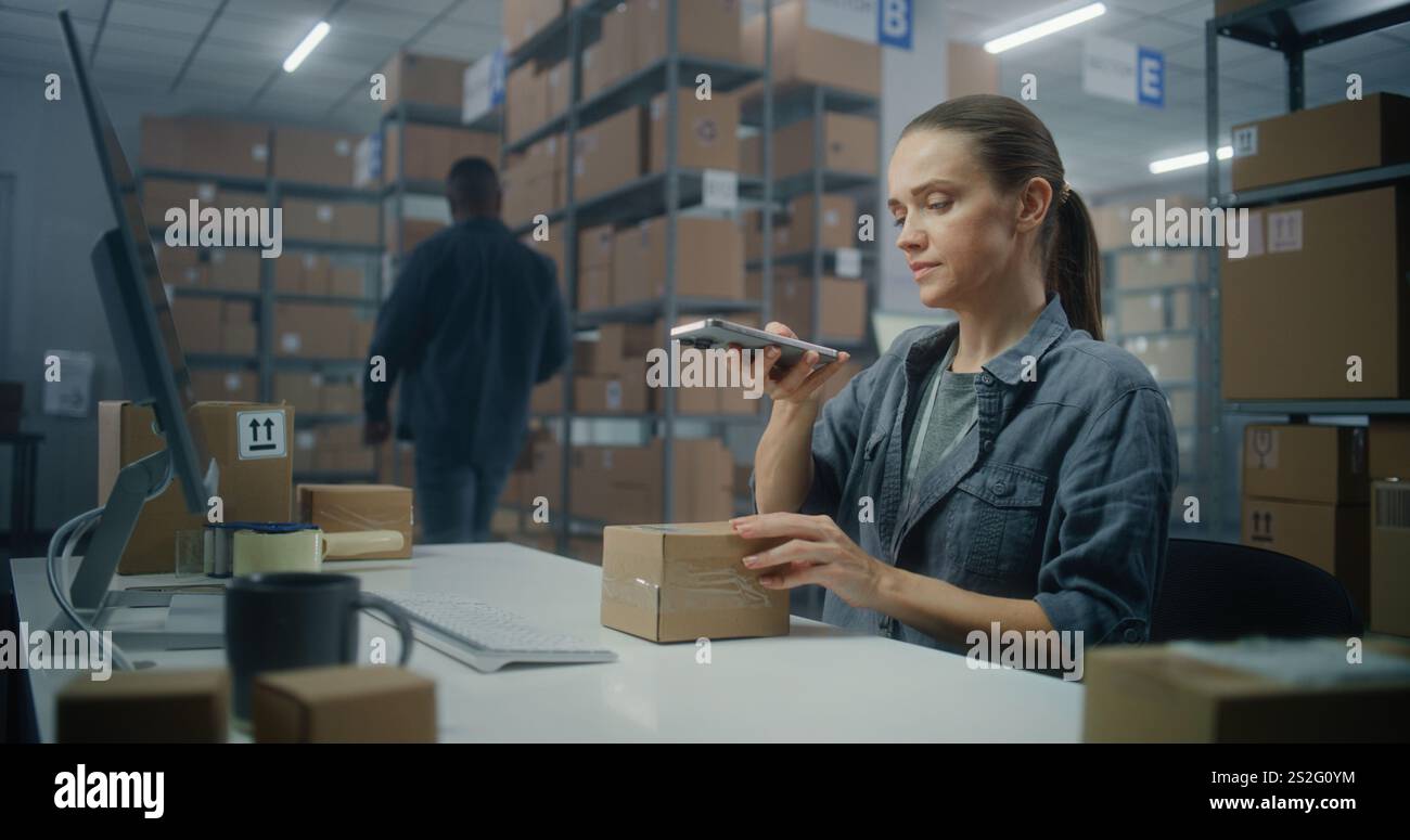 Warehouse female inventory manager works hi-res stock photography and ...