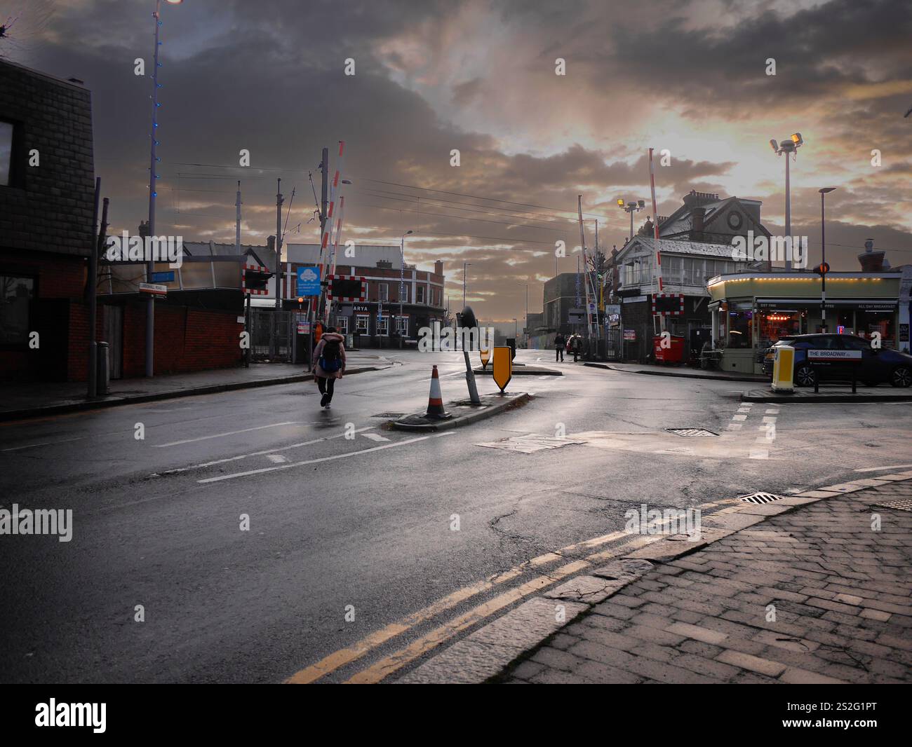 Early morning picture of Highams Park TFL railway level crossing London ...