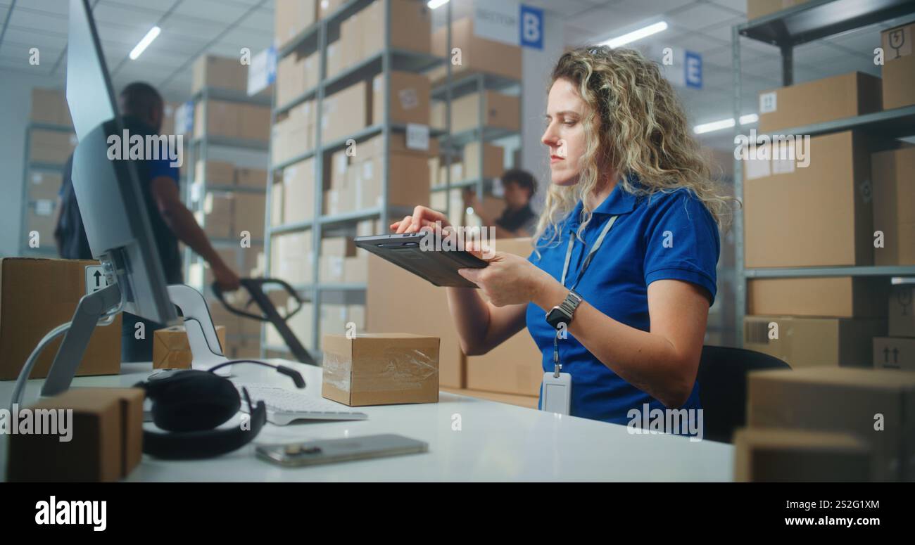 Female warehouse clerk scans parcels hi-res stock photography and images - Alamy