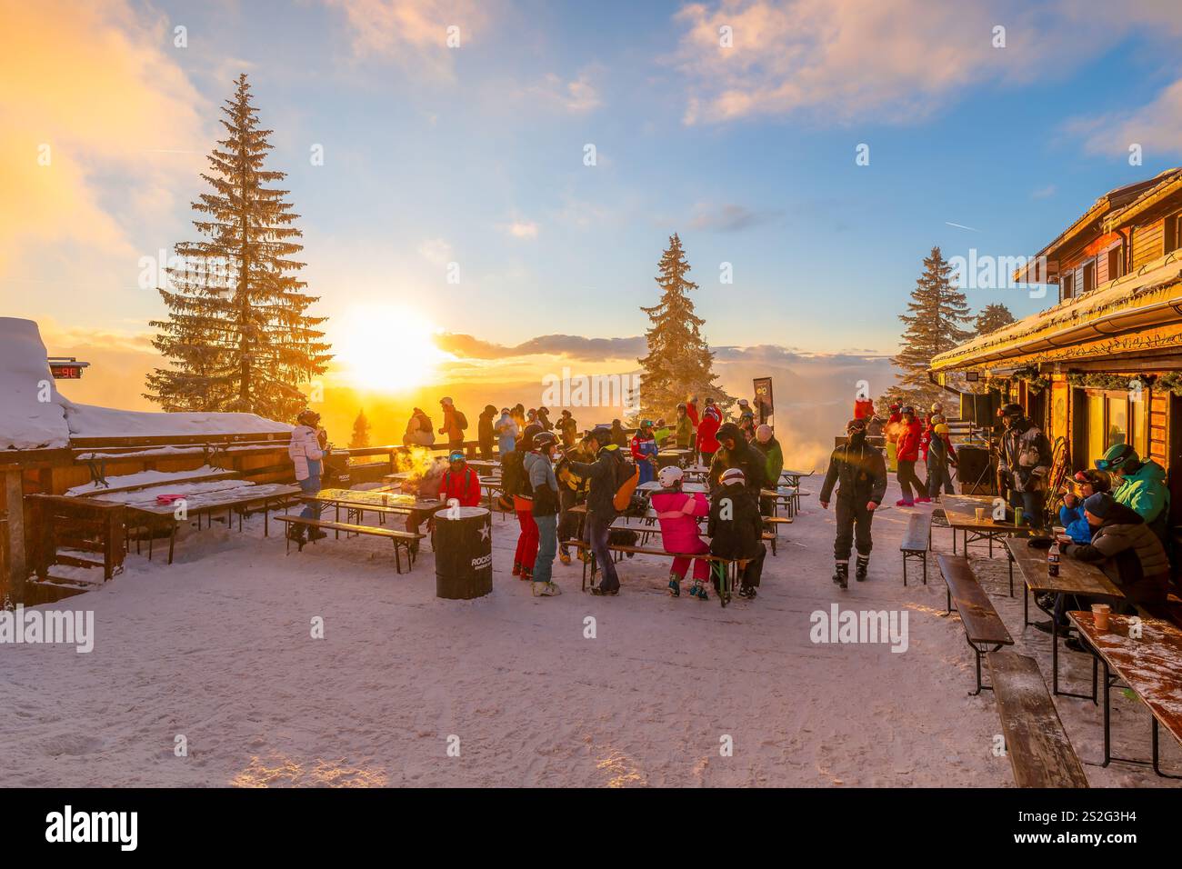 Brasov, Romania - January 4, 2025: Sunset at Postavaru chalet in Poiana ...