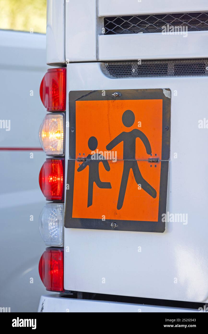 Orange Warning Sign Children at School Bus Transport Stock Photo - Alamy