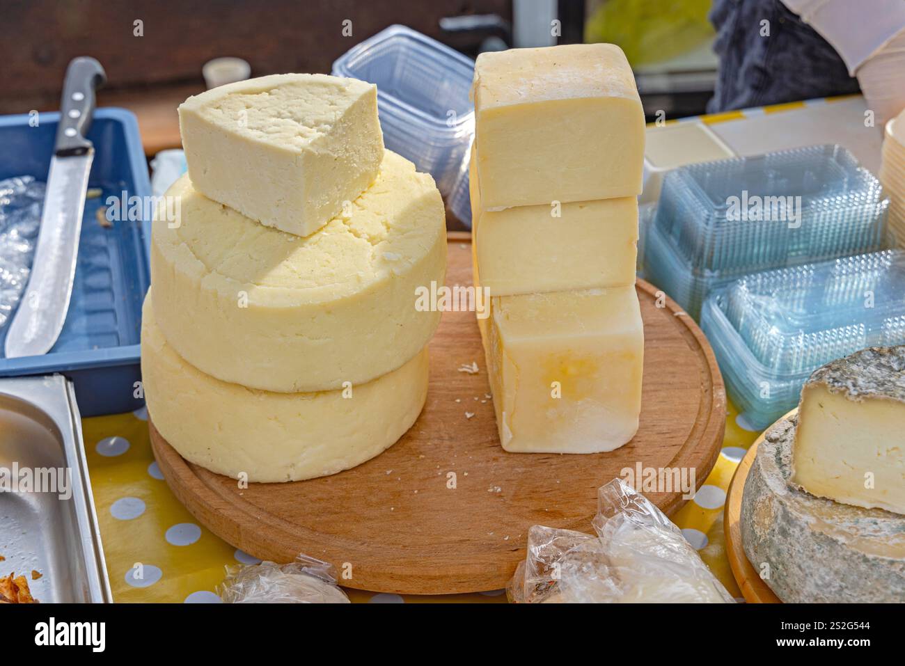 Stack of Cows Cheese Dairy Products at Farmers Market Stall Stock Photo ...