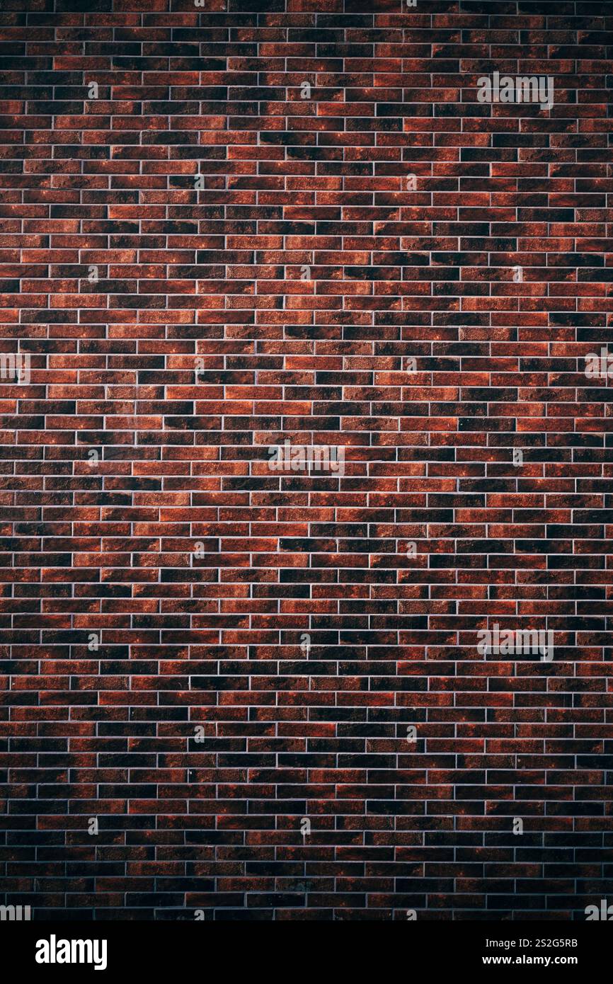 Texture of a building facade decorated with brick slips as background ...