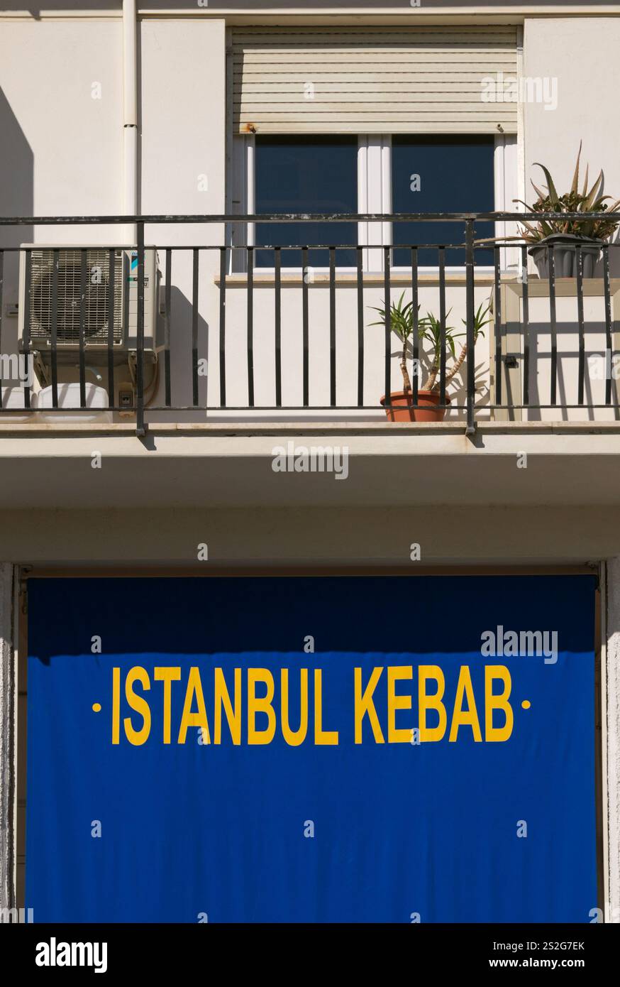 kebab shop with apartments above Stock Photo - Alamy