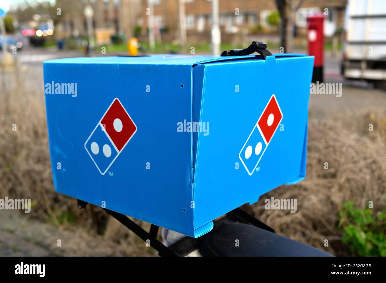 Cambridge UK, 07 January 2025. Domino's pizza online delivery bicycle ...