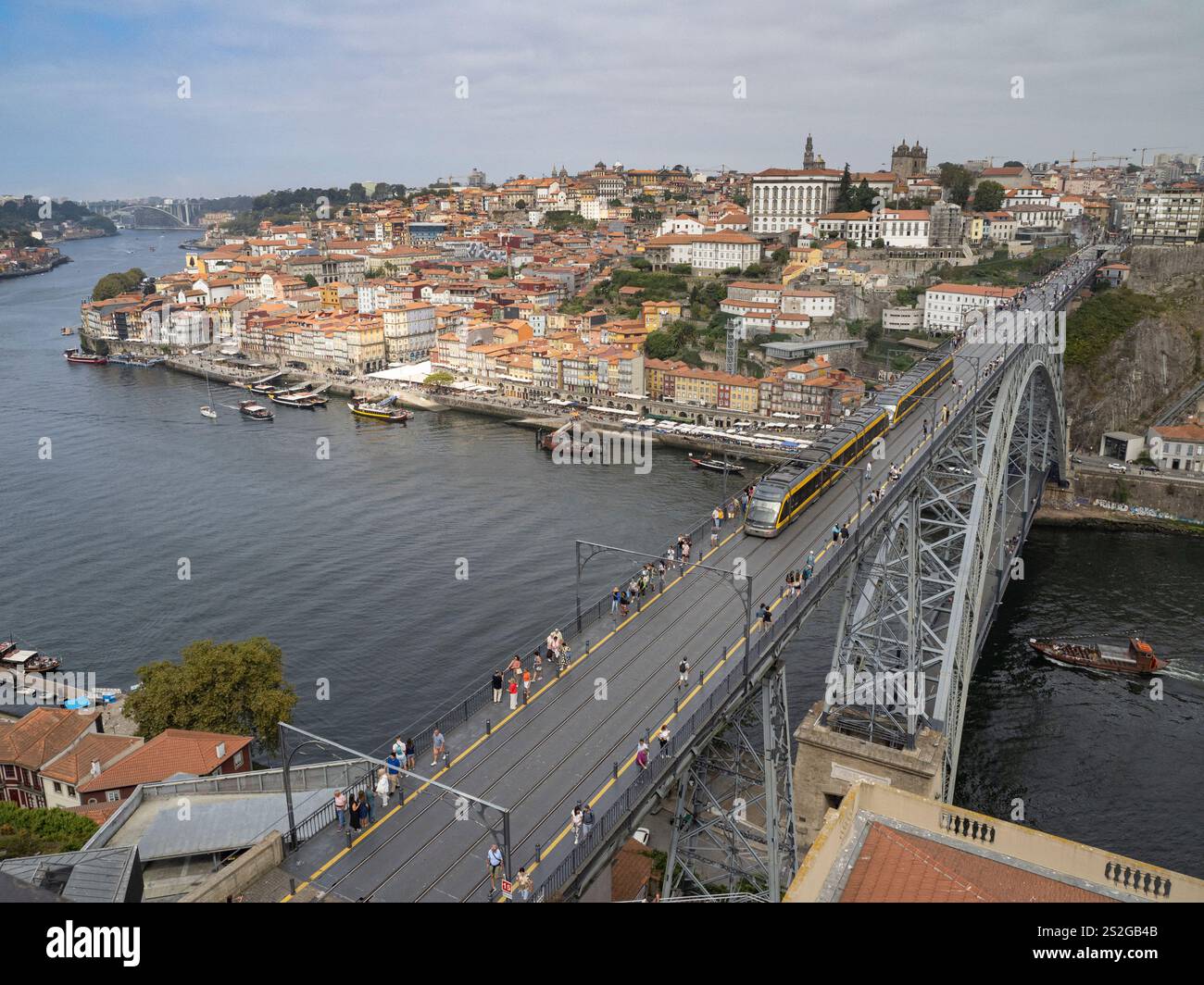 Metro train crossing the Dom Luis bridge over the river Douro in Oporto ...