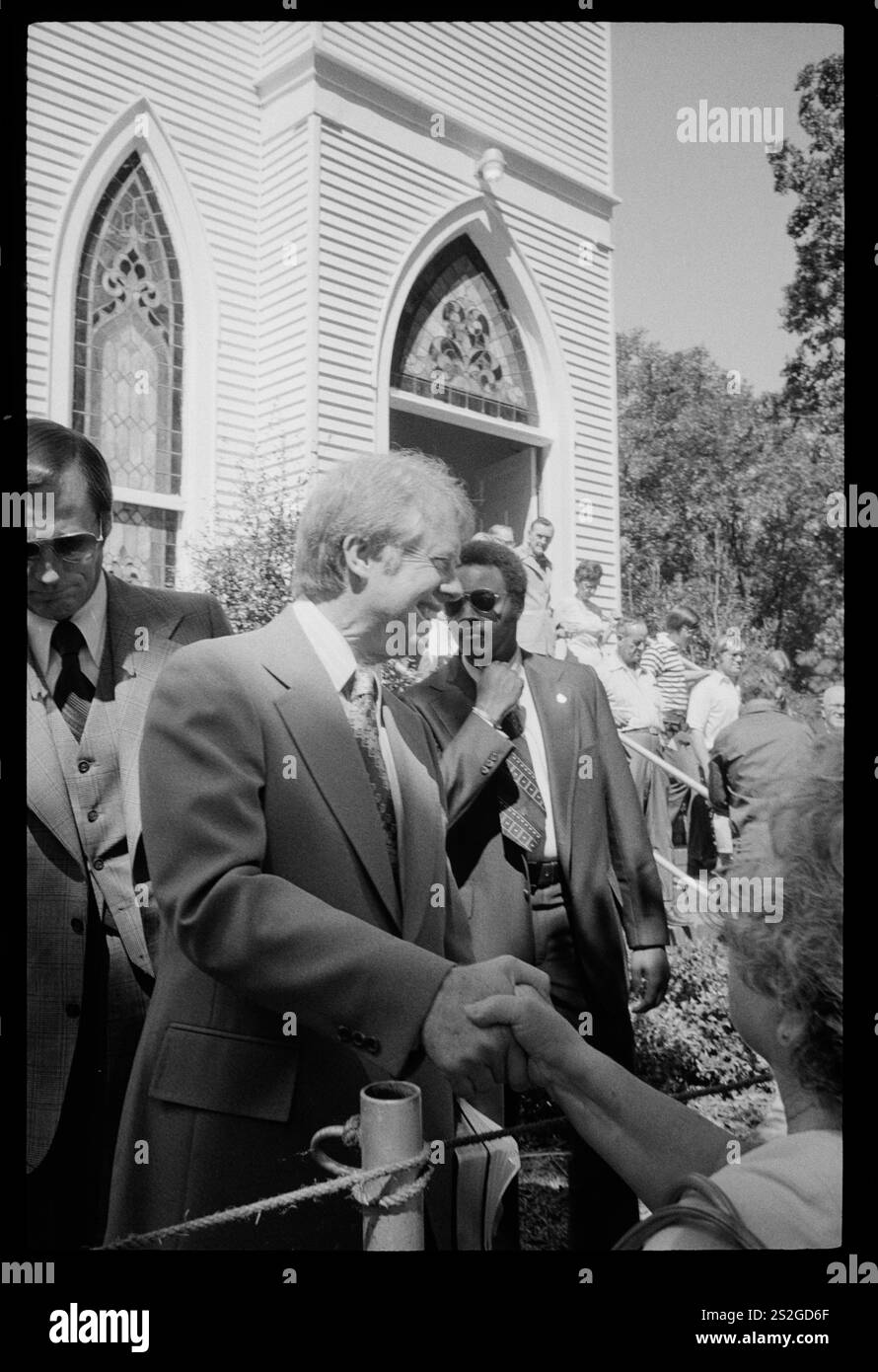 Jimmy Carter shakes well-wishers' hands after leaving a church during ...