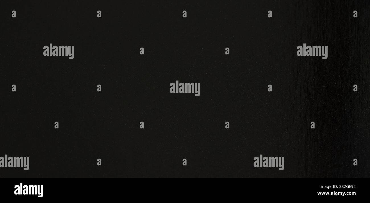 Deep black backdrop enhances focus on creative elements, providing ...