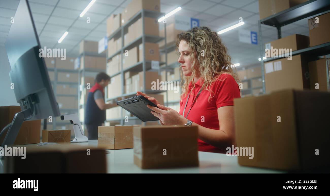 Female warehouse clerk scans parcels hi-res stock photography and images - Alamy