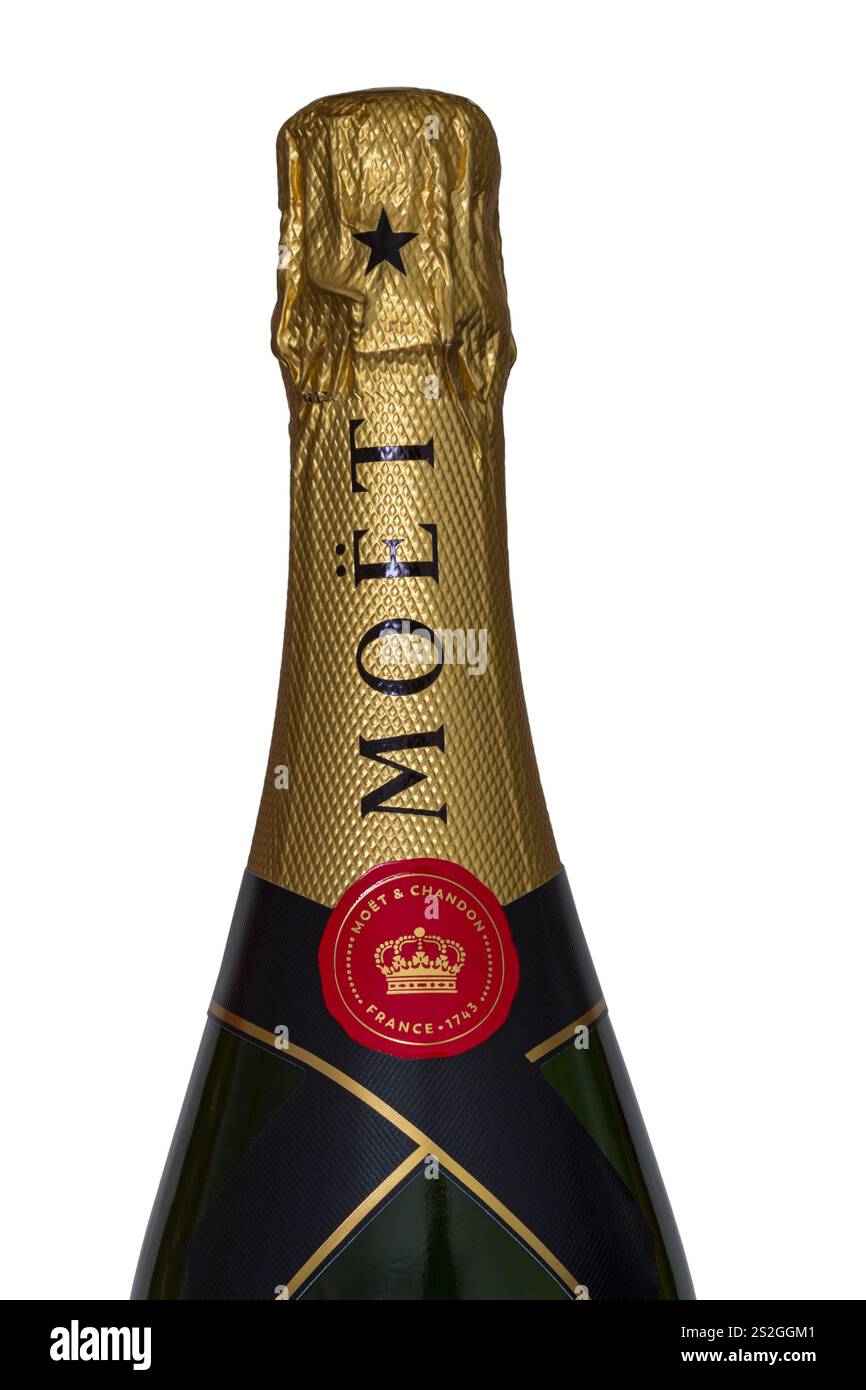 foil top on bottle of Moet & Chandon Champagne imperial set on white background - product of ...
