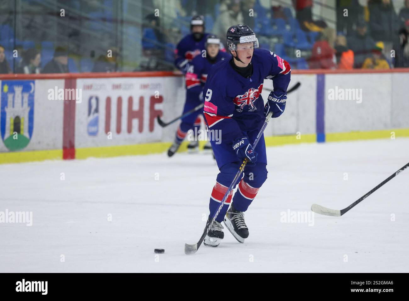 Brodie Kay of Great Britain plays the puck during the 2025 Ice Hockey ...