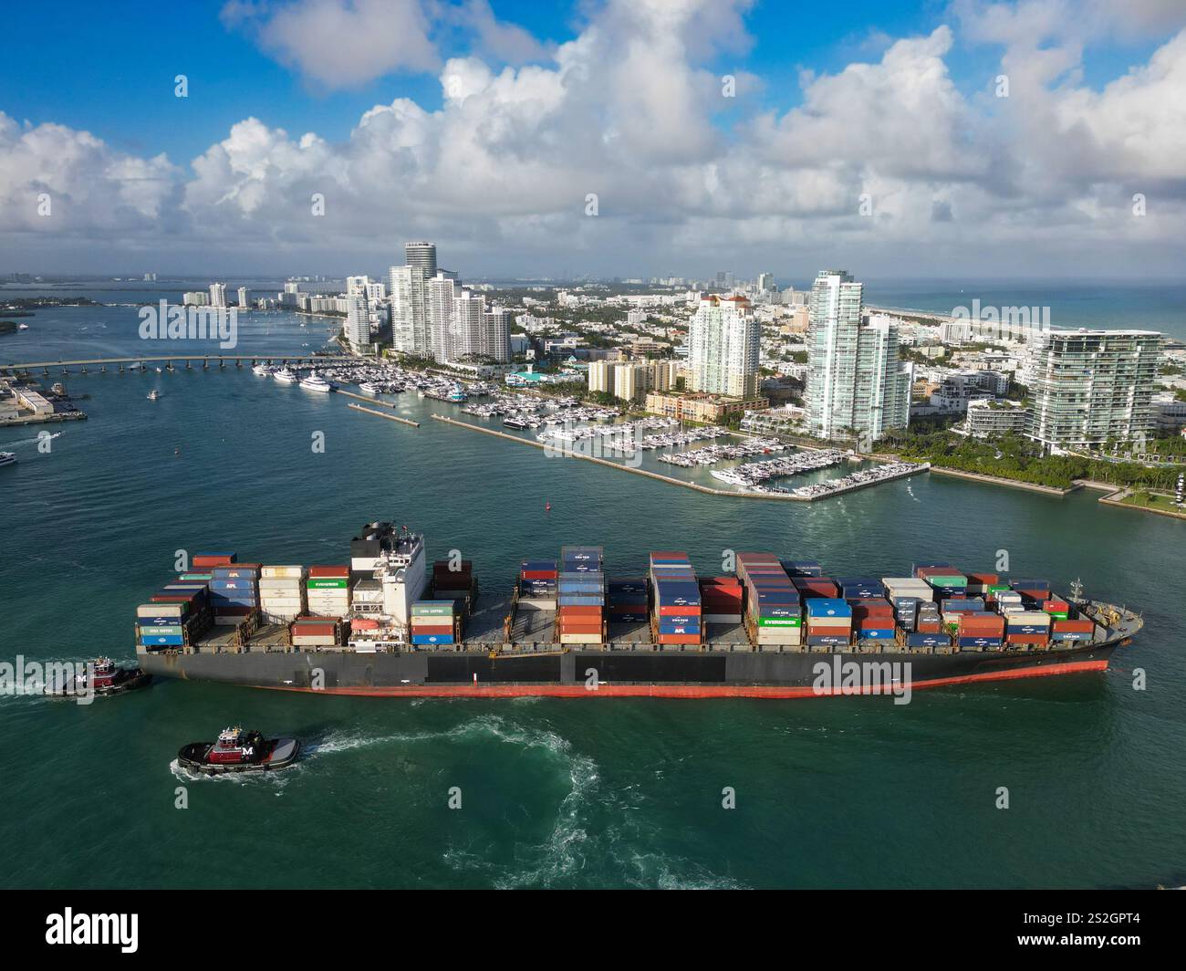 Miami, Florida, USA - December 17, 2024: Cargo ship with container and ...