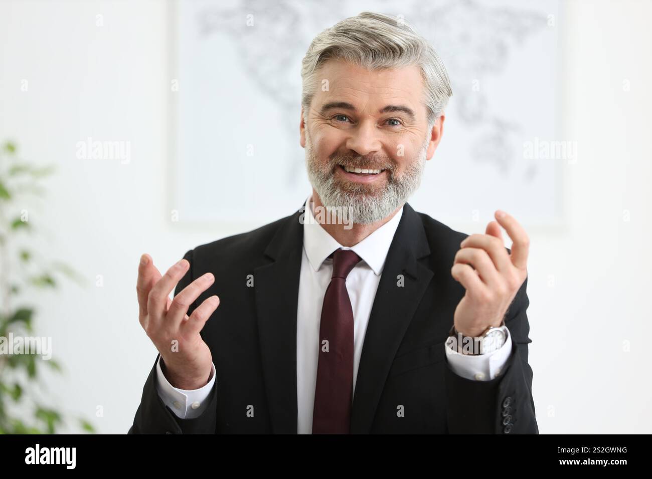 Portrait of banker in jacket at workplace Stock Photo - Alamy