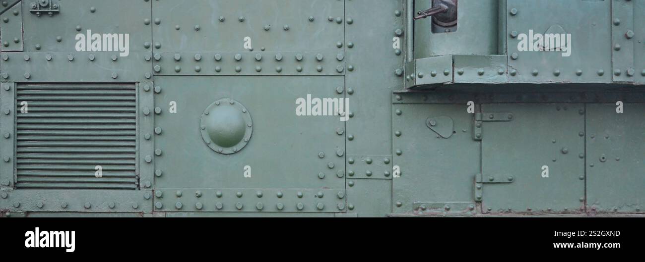 Abstract green industrial metal textured background with rivets and ...