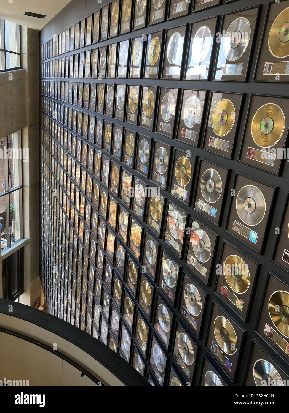 Wall of records to listen over and over again Stock Photo - Alamy