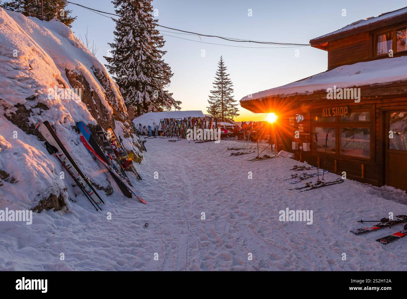 Brasov, Romania - January 4, 2025: Sunset at Postavaru chalet in Poiana ...