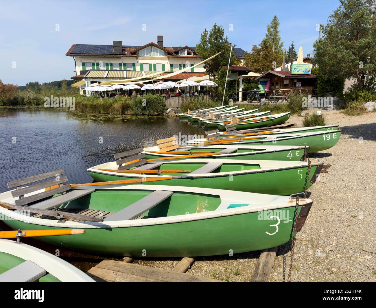 Rowing boats at Restaurant Elbsee on Sept 4 2024 in Aitrang, Germany ...