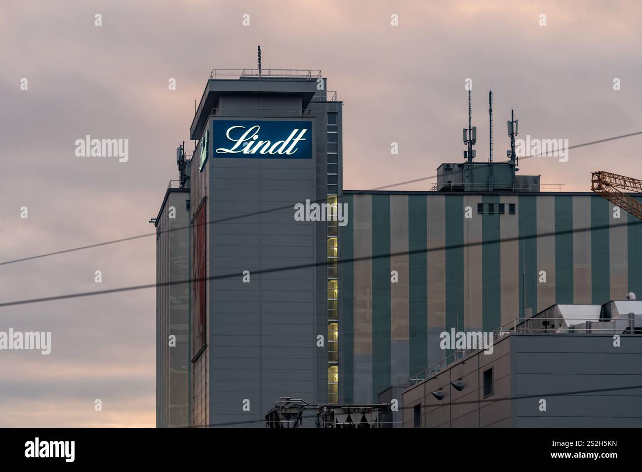 Kilchberg, Switzerland - December 8, 2024: Sunset view of the Lindt ...